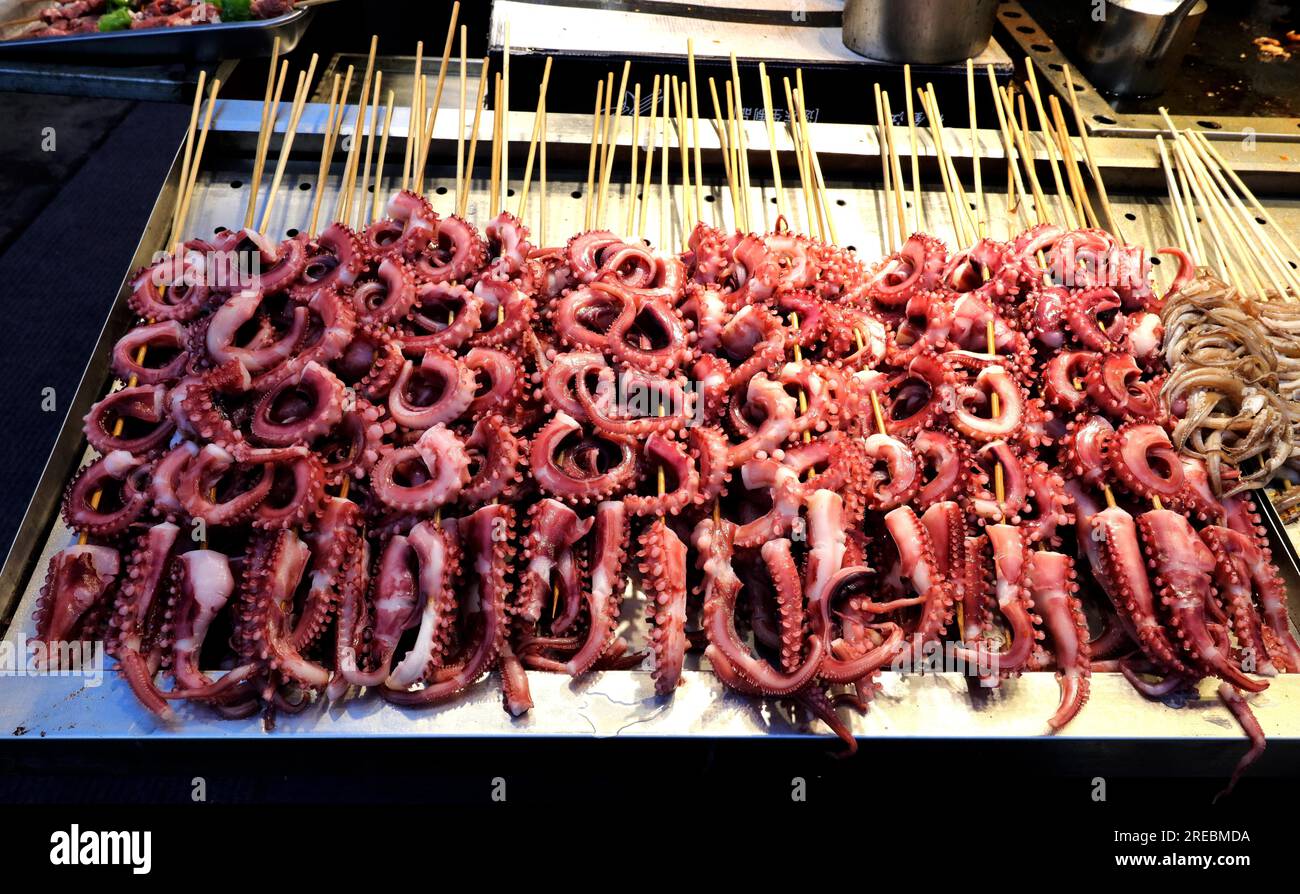 Visit the night market on a food street in Changchun City, northeast ...