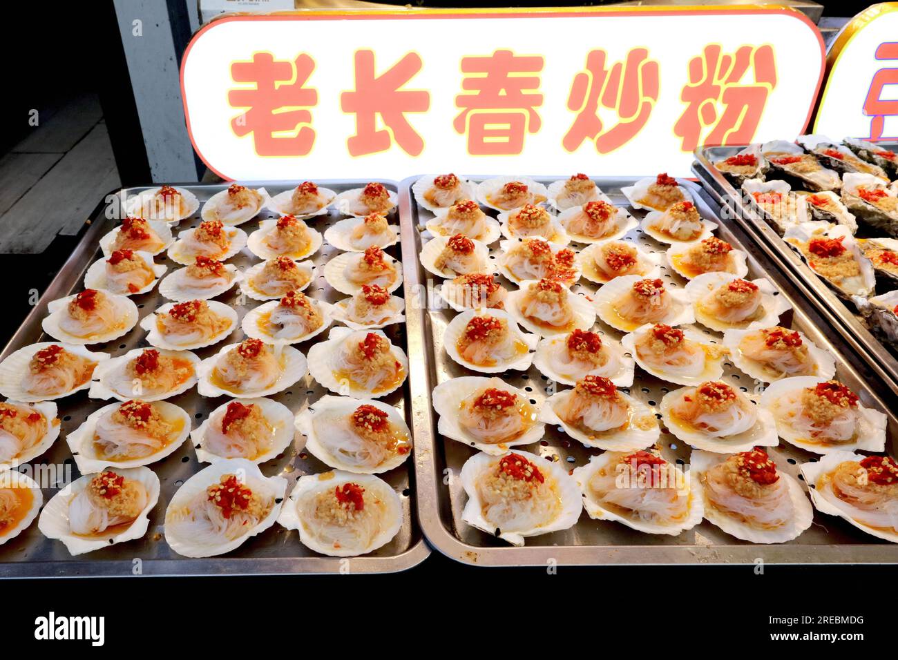 Visit the night market on a food street in Changchun City, northeast ...