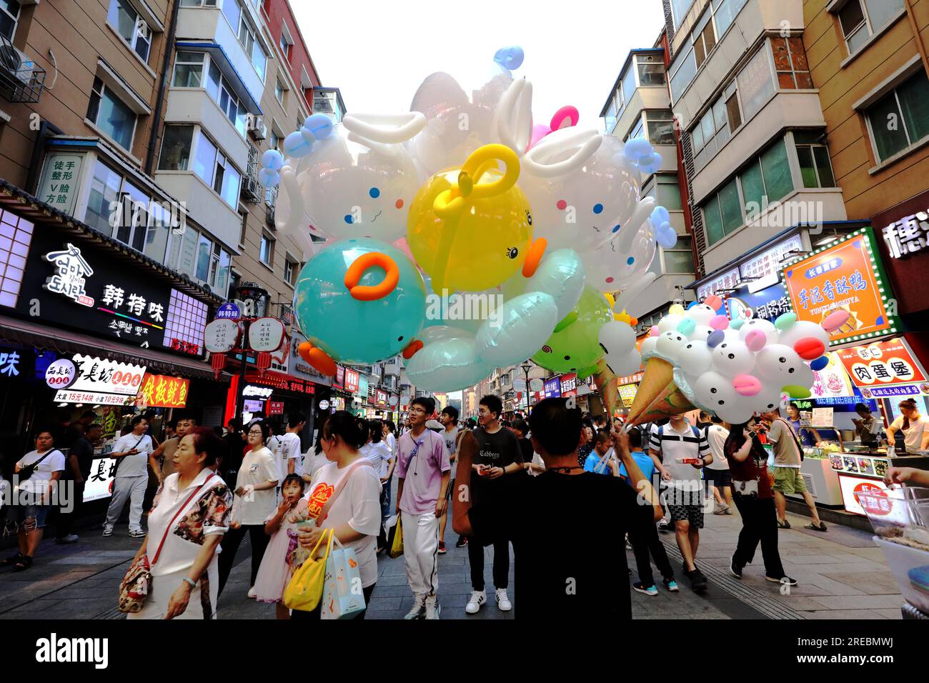 Visit the night market on a food street in Changchun City, northeast ...