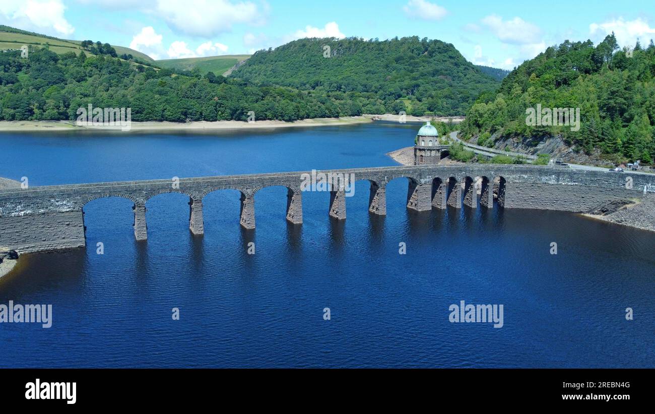 Drone view of the Garreg Ddu Dam & Bridge, Caban-coch Reservoir, Elan ...