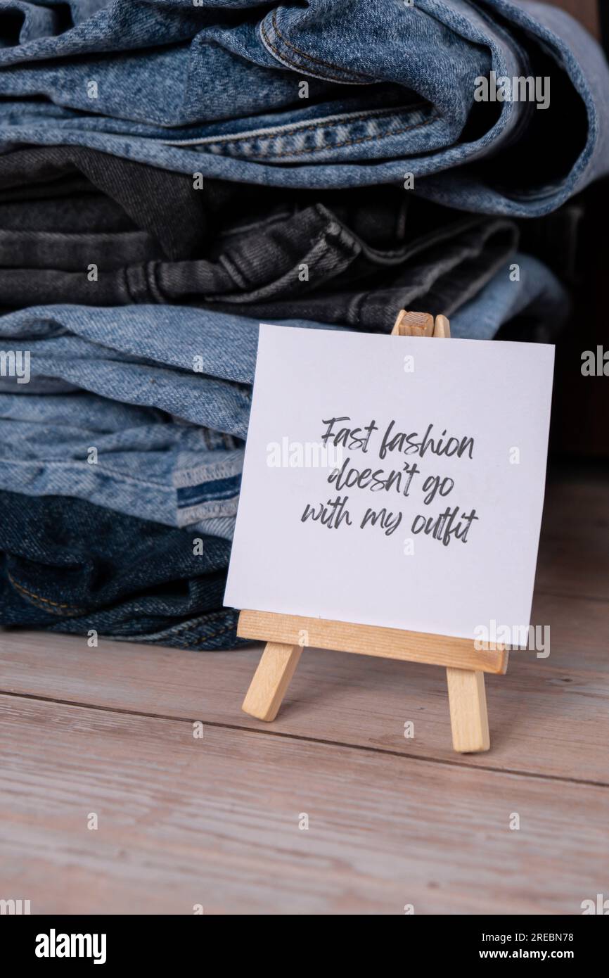 FAST FASHION DOESNT GO WITH MY OUTFIT text on paper note on Jeans ...