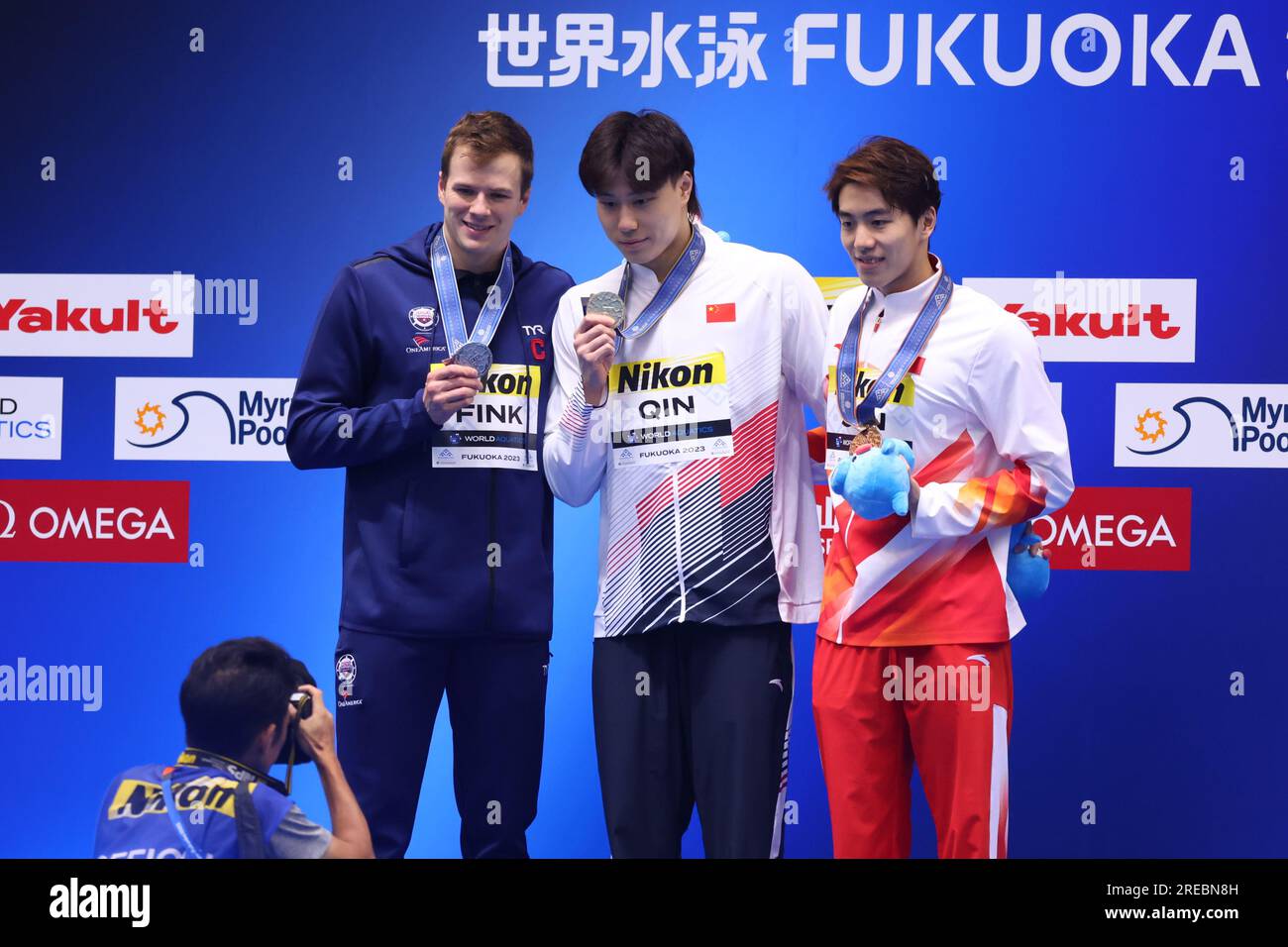 Nic FINK (USA), Haiyang QIN (CHN), Jiajun SUN (CHN) celebrate with ...