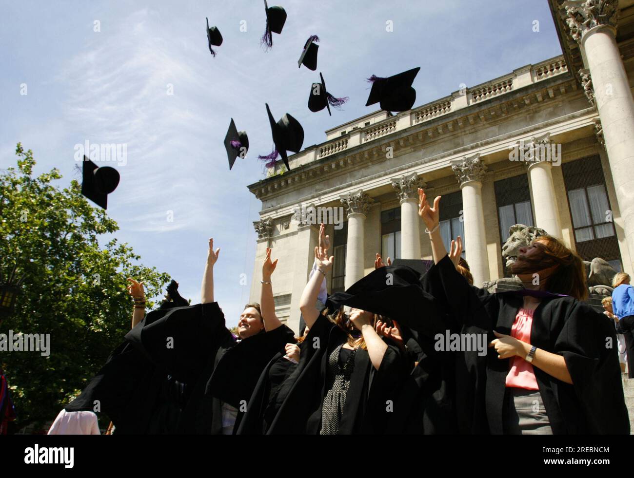 File photo dated 16/07/08 of new graduates throw their mortarboard hats ...