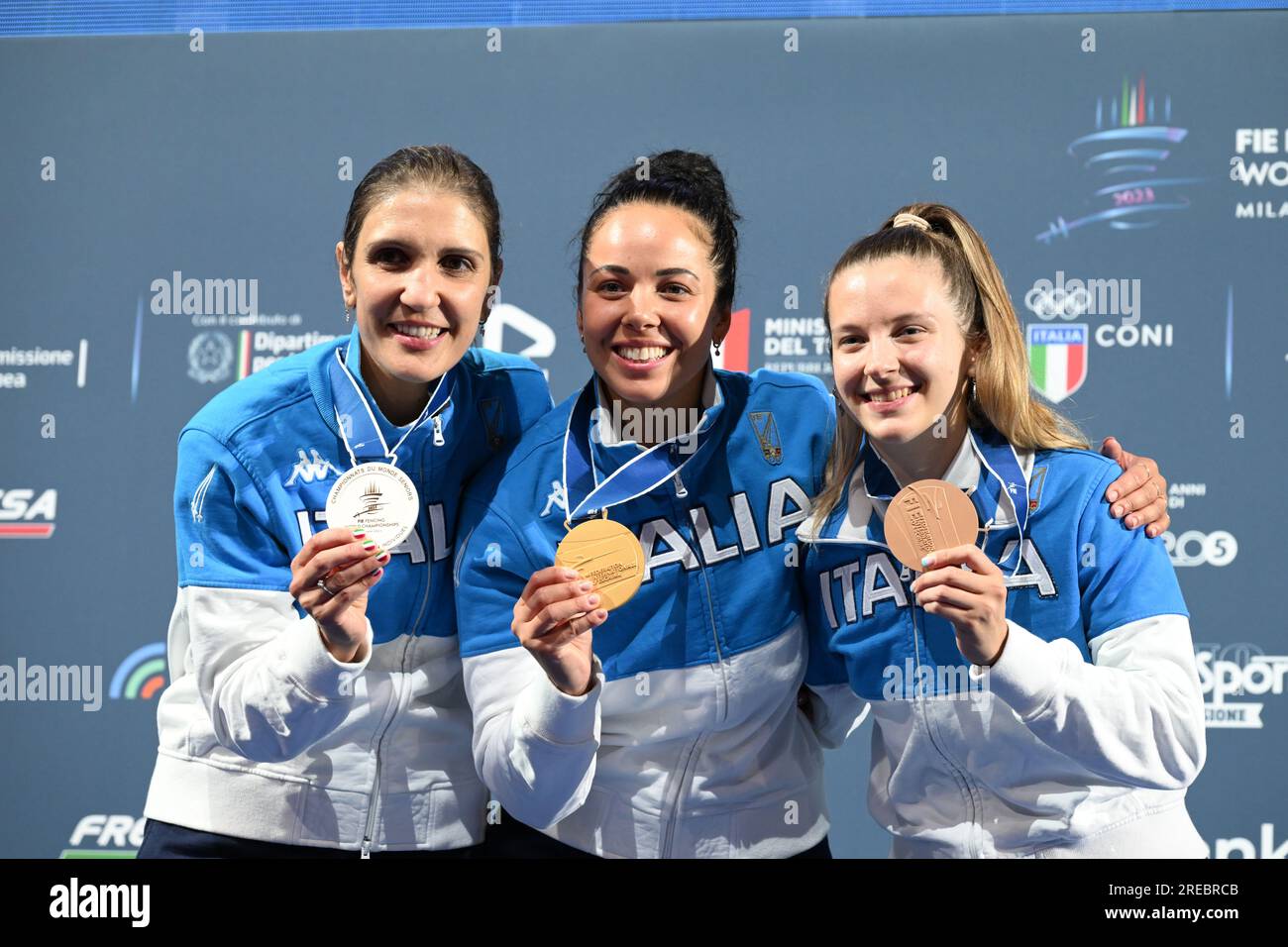 Champion Alice Volpi of Italy (C) celebrates with second place Arianna ...