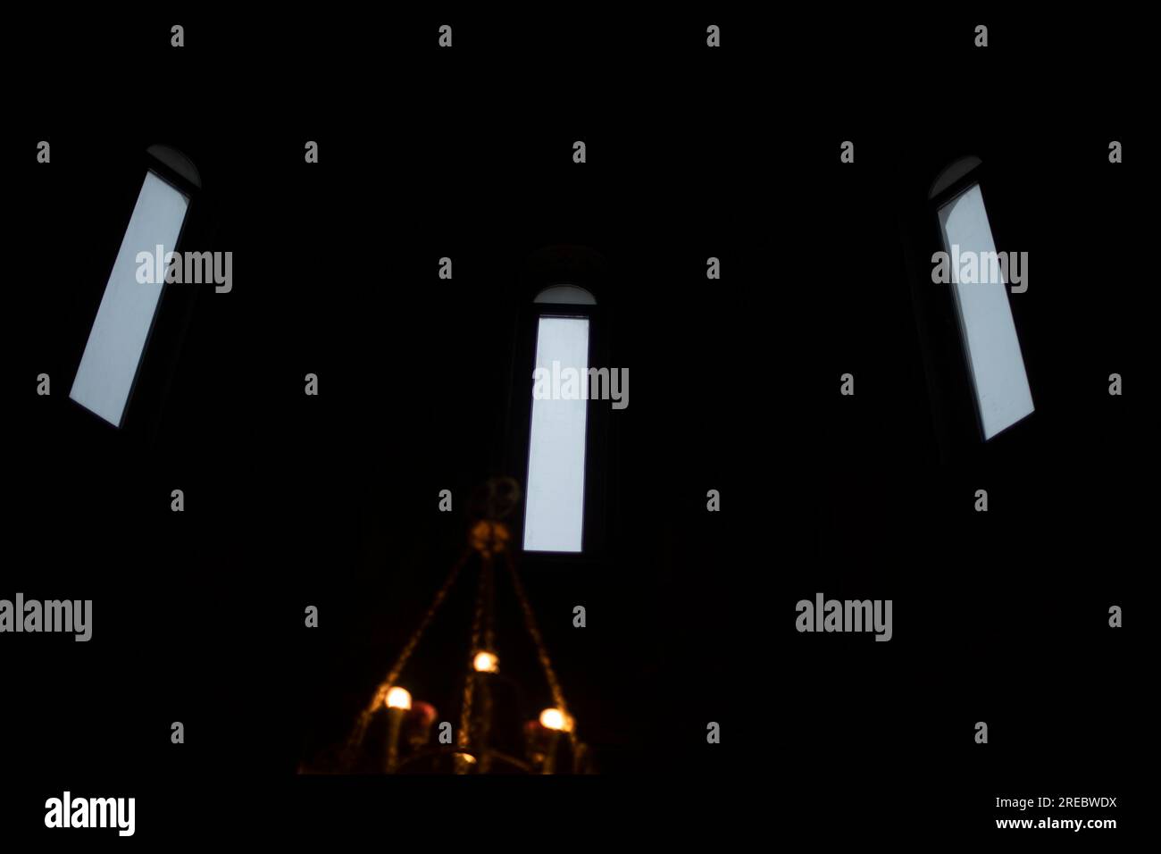 Windows in Church. Three windows on black background. Details of ...