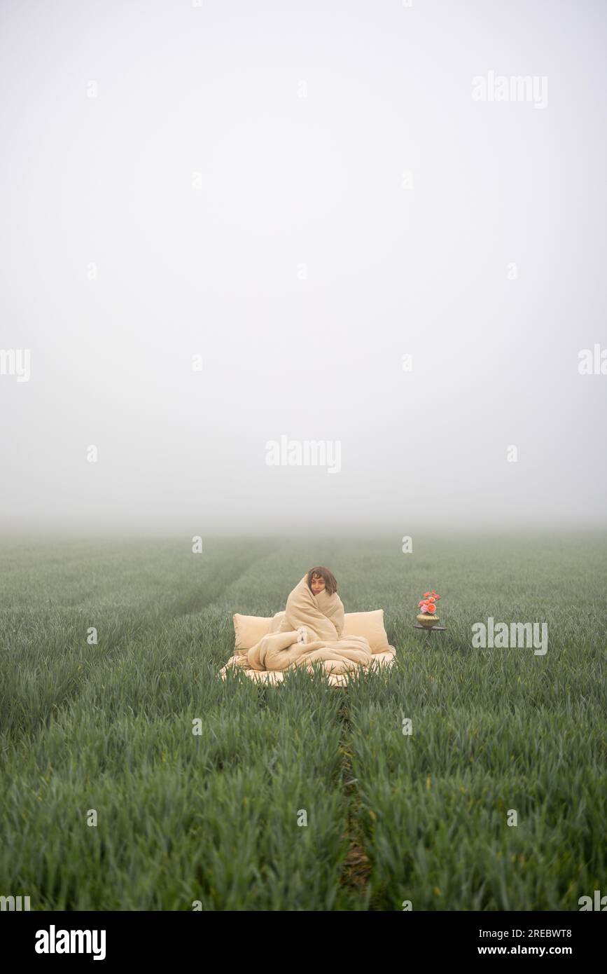 Woman wakes up on field outdoors Stock Photo - Alamy Woman wakes up on field outdoors Stock Photo - Alamy