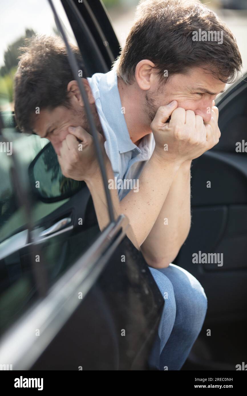 emotional man in tears in his car Stock Photo - Alamy