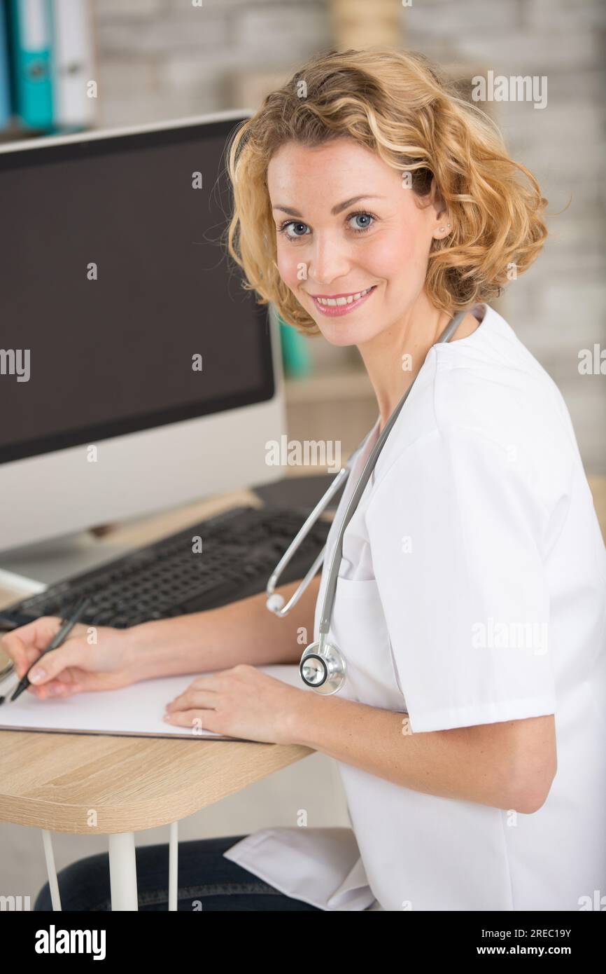 Gorgeous receptionist hi-res stock photography and images - Alamy