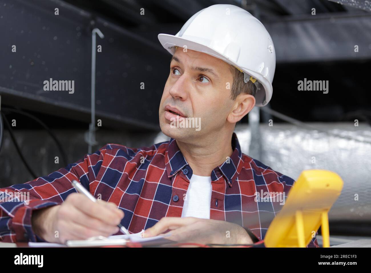 Electrician working on indoor hi-res stock photography and images - Alamy