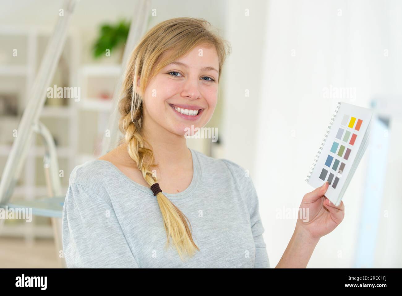young designer choosing between color swatches Stock Photo - Alamy