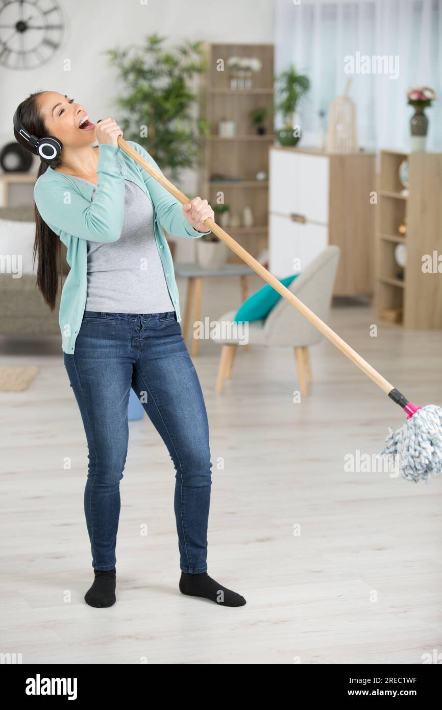 Cleaning happy home singing hi-res stock photography and images - Alamy