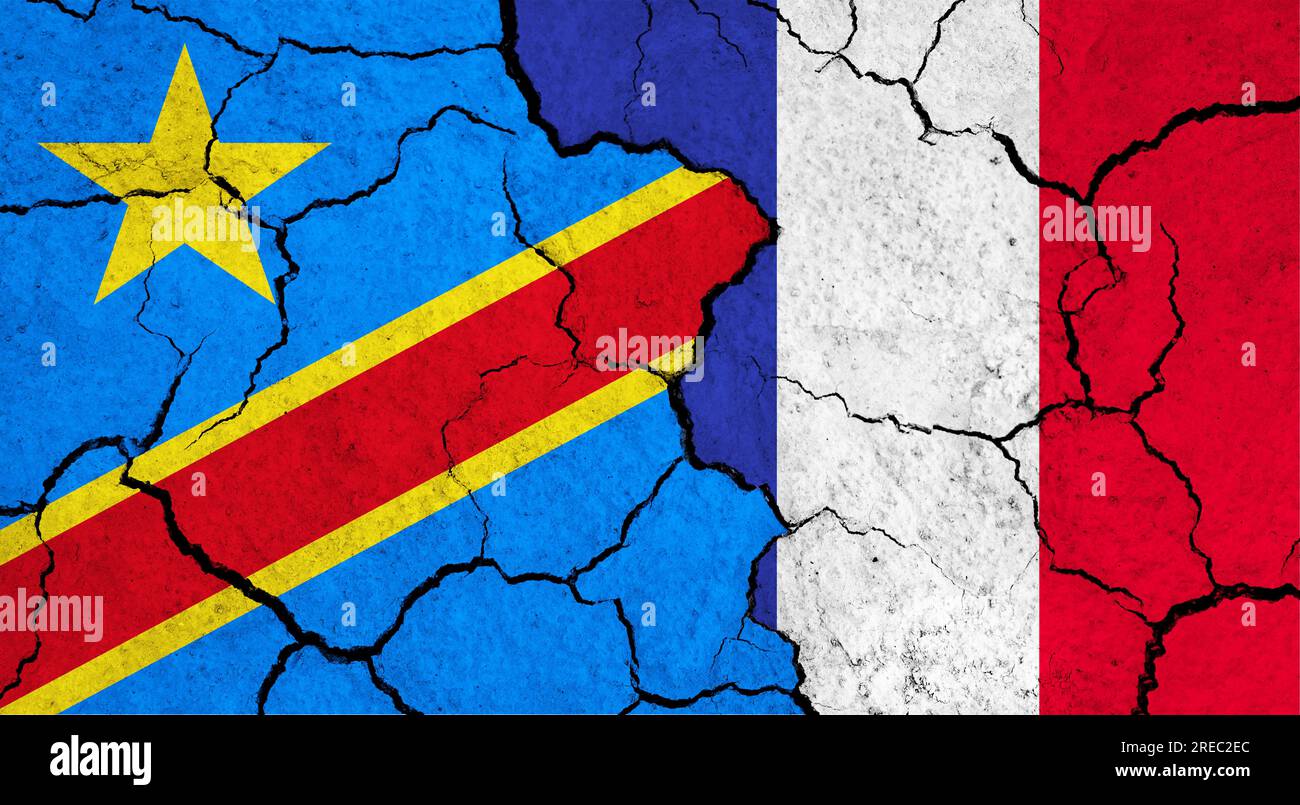 Flags of Congo - Democratic Republic and France on cracked surface ...