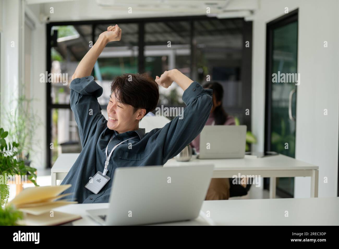 Businessman desk office leaning back hi-res stock photography and ...