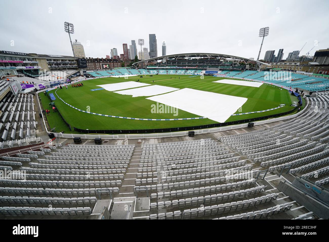 Rain covers protect the wicket, and parts of the outfield ahead of day ...
