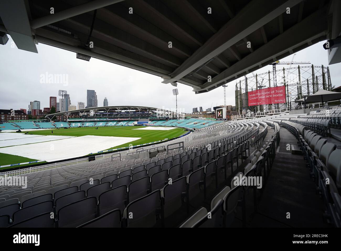 Rain covers protect the wicket, and parts of the outfield ahead of day ...