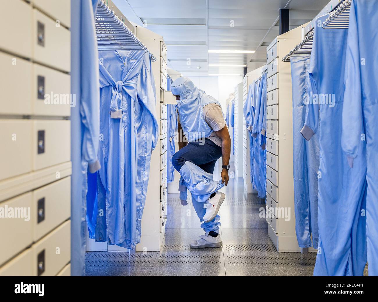 NIJMEGEN - An employee changes clothes in the factory of chip ...