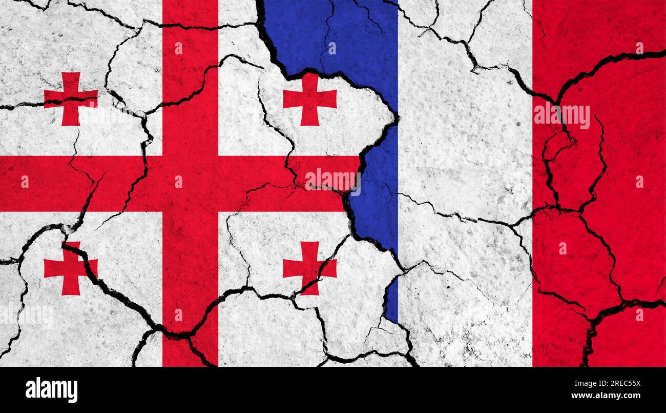 Flags of Georgia and France on cracked surface - politics, relationship ...
