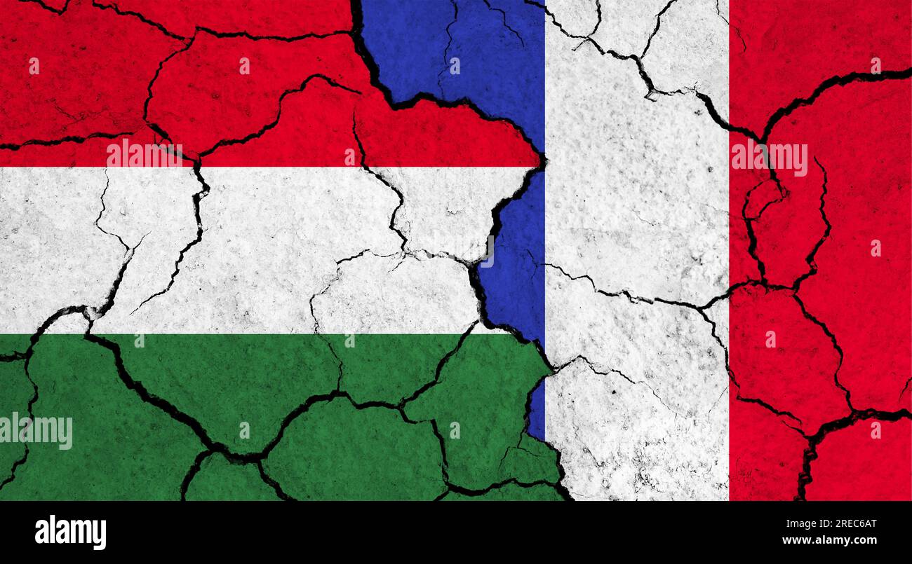 Flags of Hungary and France on cracked surface - politics, relationship ...