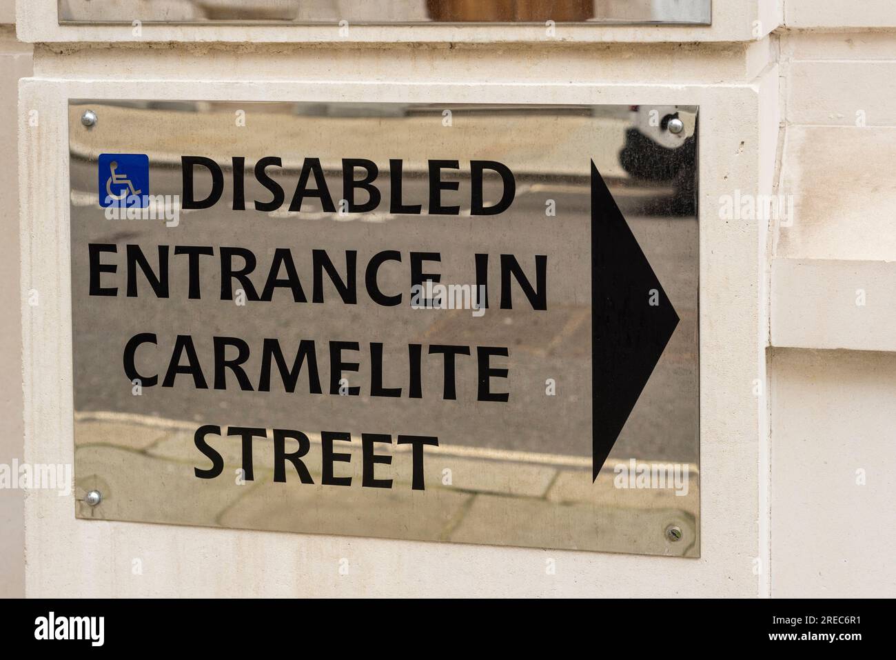 Sign showing direction for disabled people, London, UK Stock Photo - Alamy