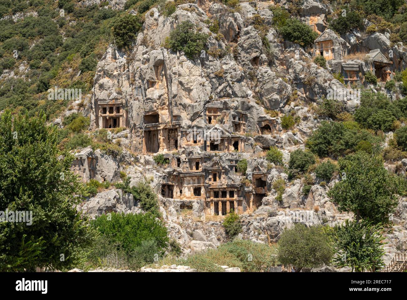 The ruins of the amphitheater and ancient rock tombs in the ancient ...