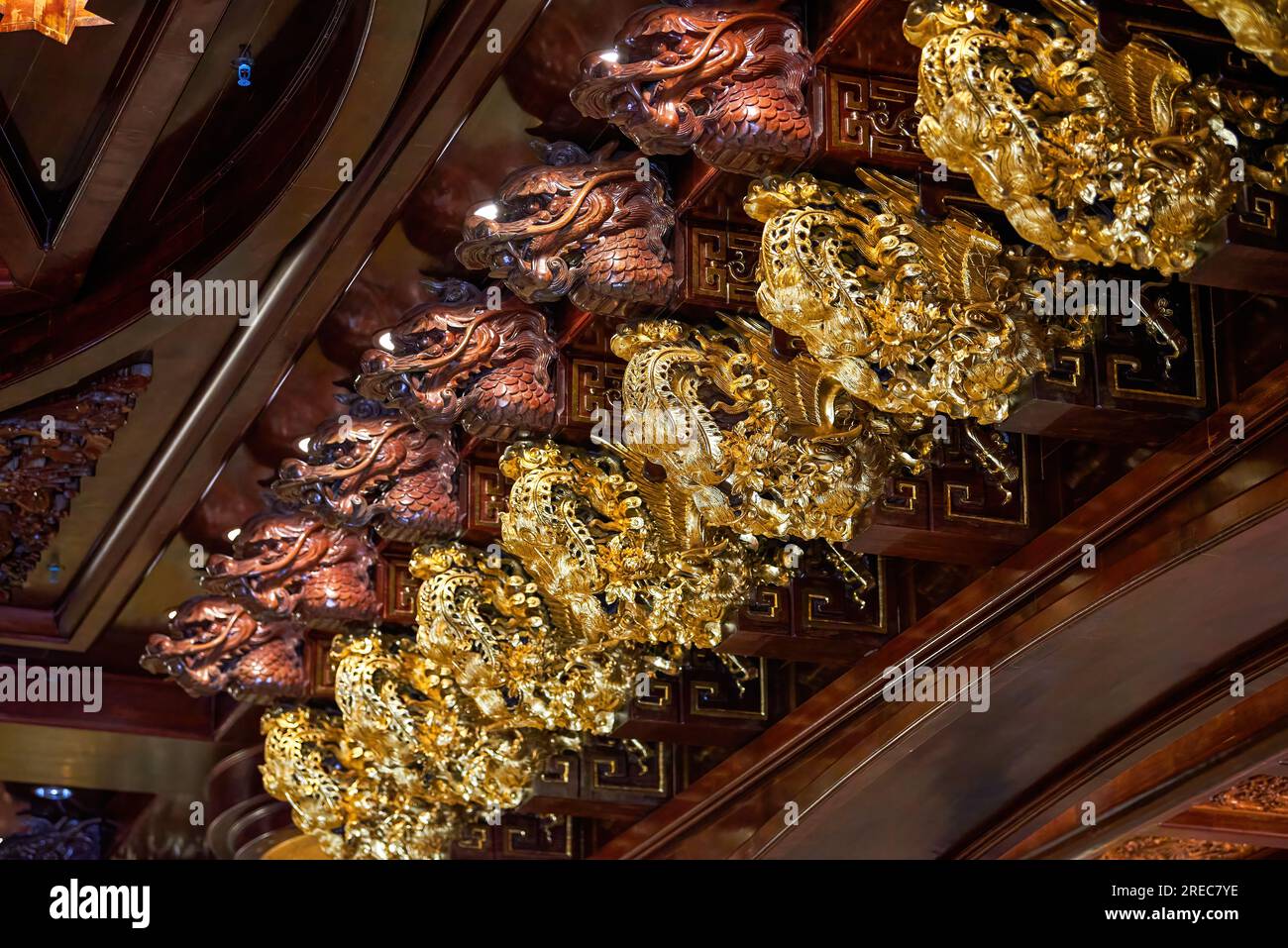 Brilliant and luxurious Chinese-style building with gold wood carving ...