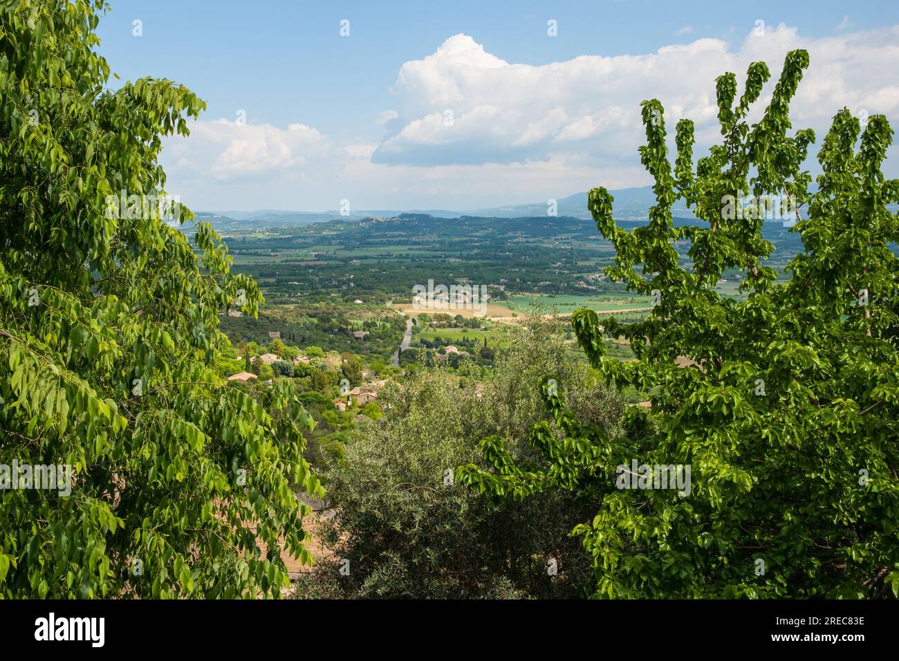 View through trees of Provence landscape from ancient French hilltop ...
