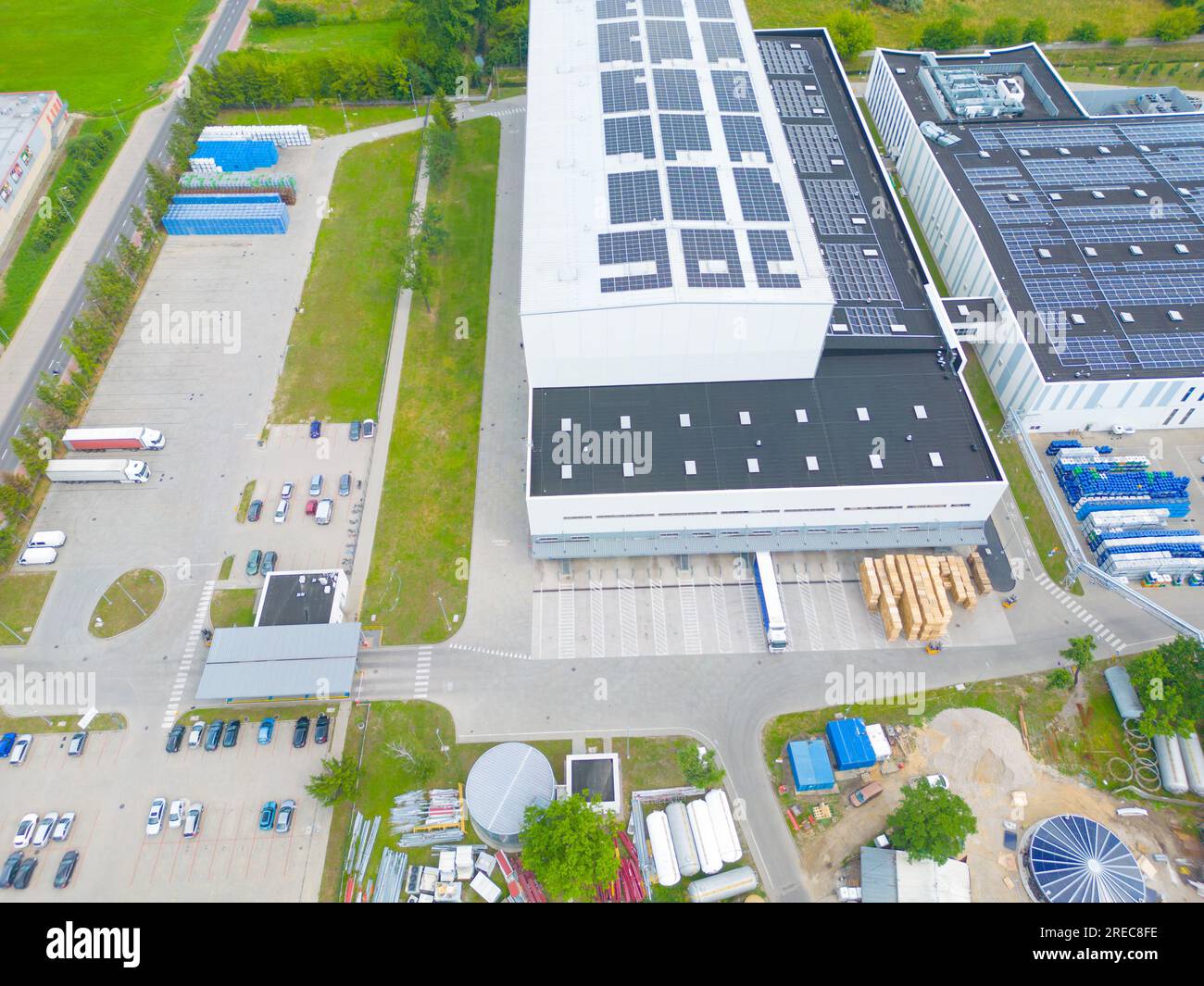Industry with low carbon footprint. Industrial warehouses with solar ...