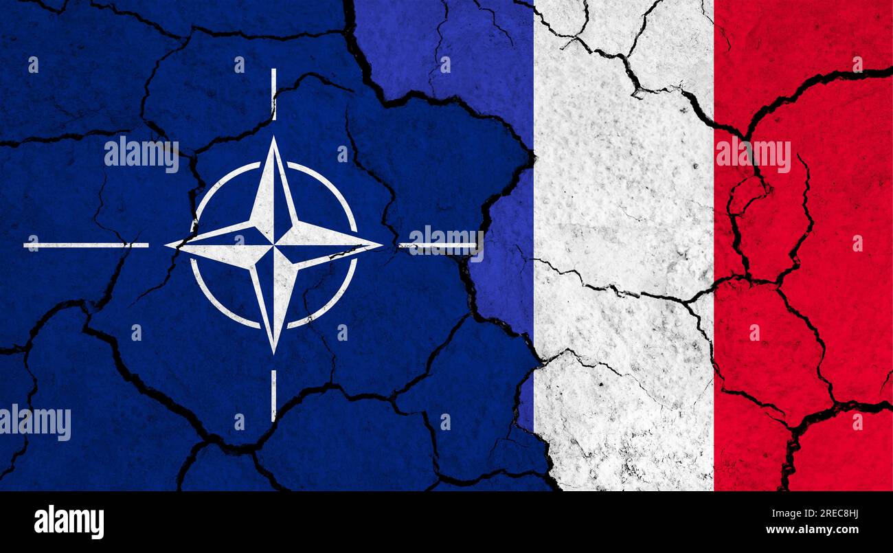 Flags of NATO and France on cracked surface - politics, relationship ...