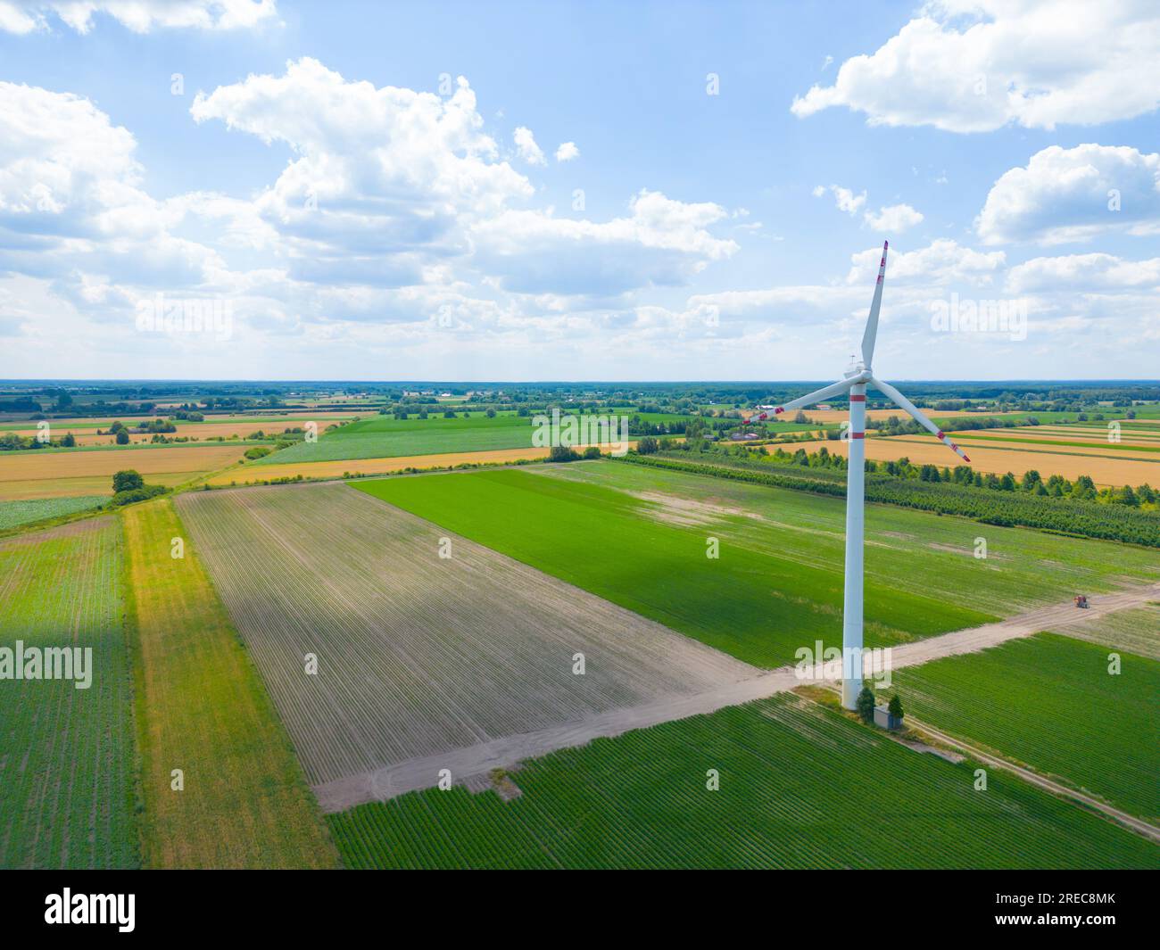 Aerial drone view of wind power turbines, part of a wind farm. Wind ...