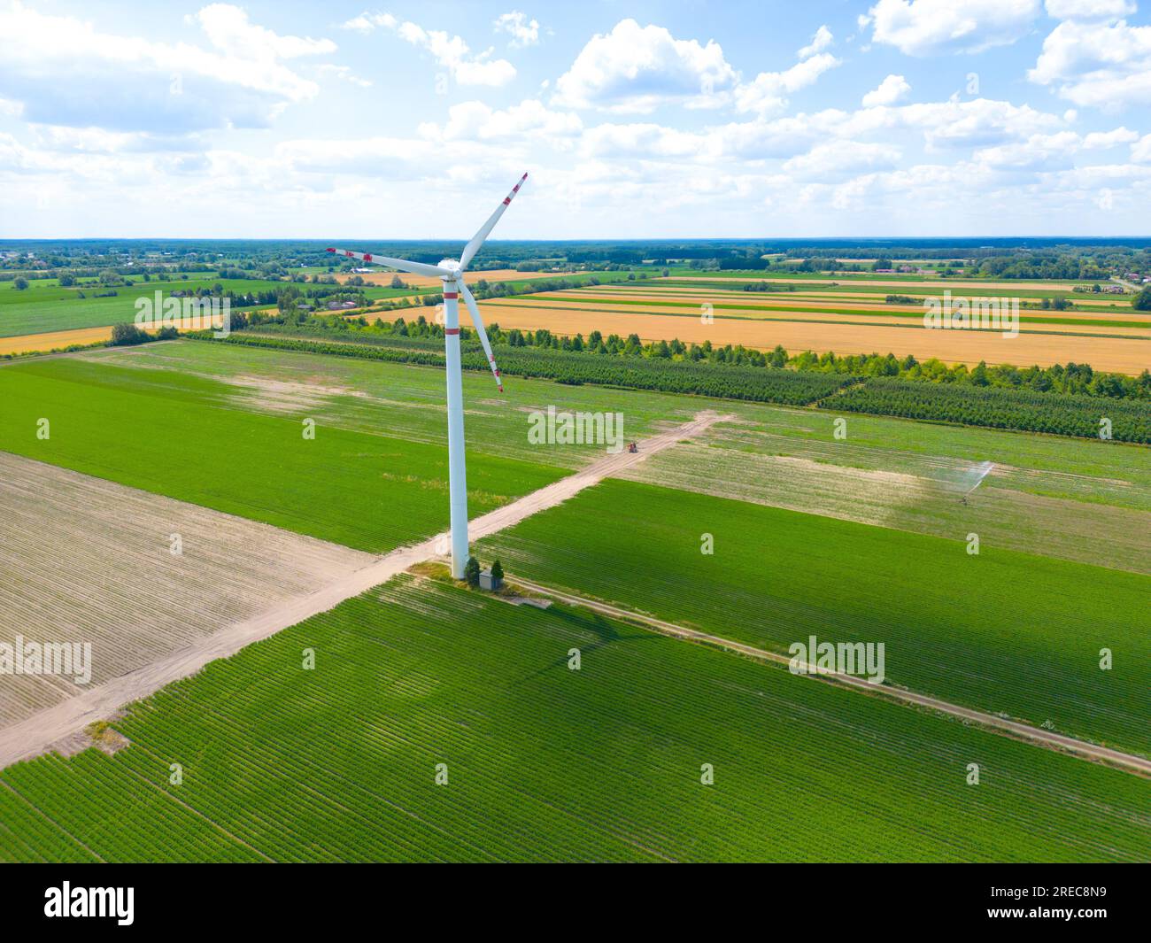 Aerial drone view of wind power turbines, part of a wind farm. Wind ...
