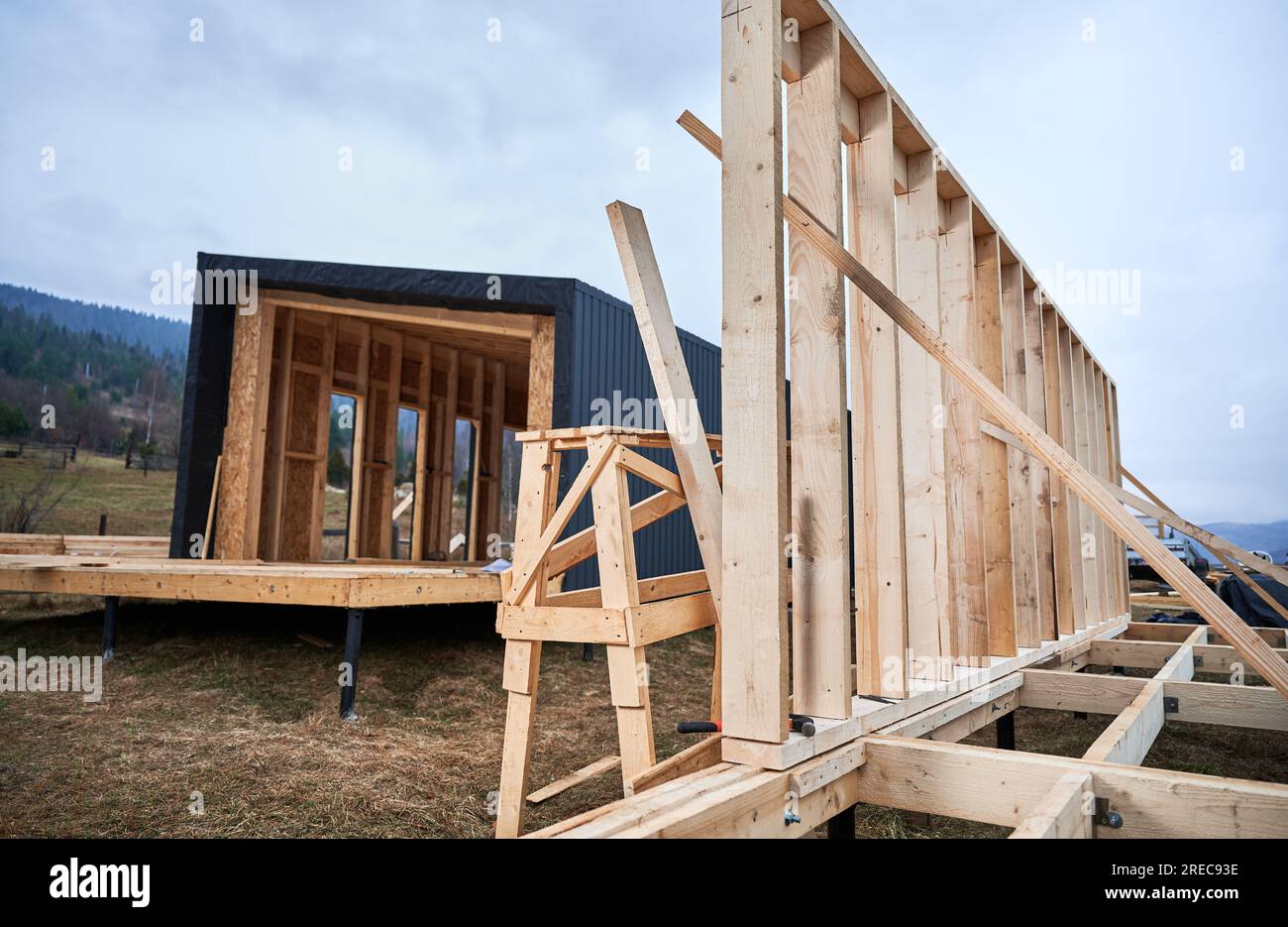 Wooden frame house on pile foundation in the Scandinavian style ...