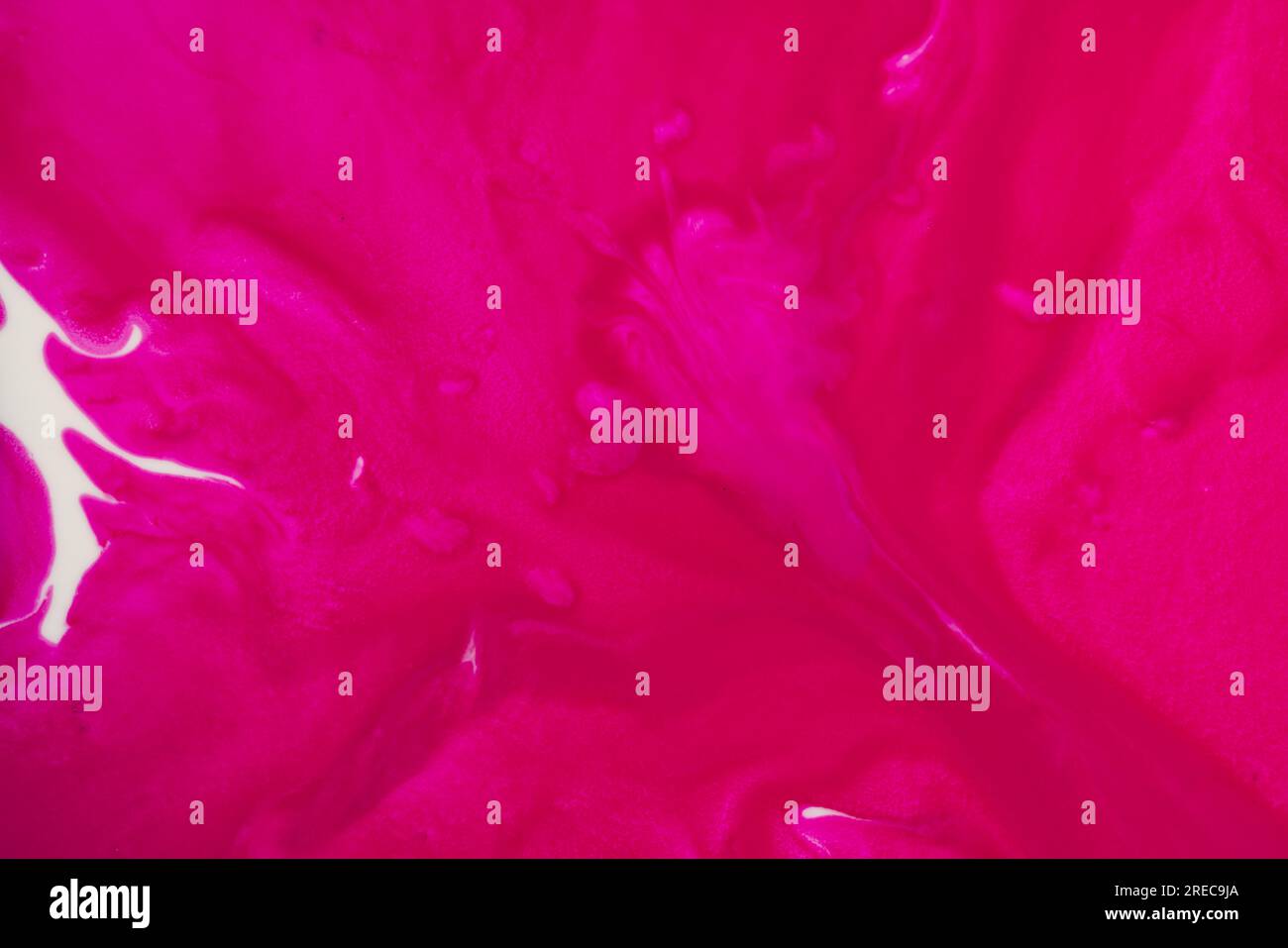 Close up of bright pink ink in water with copy space background Stock ...