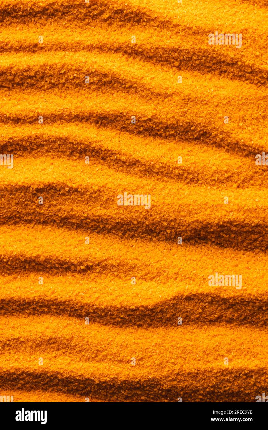 Close up of pattern of orange sand and copy space background Stock ...