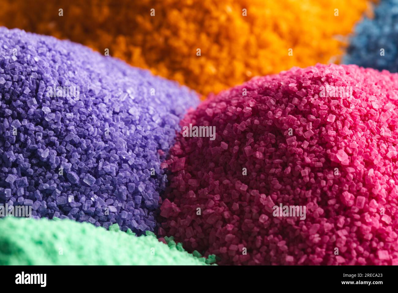 Close up of heaps of multi coloured sand Stock Photo - Alamy