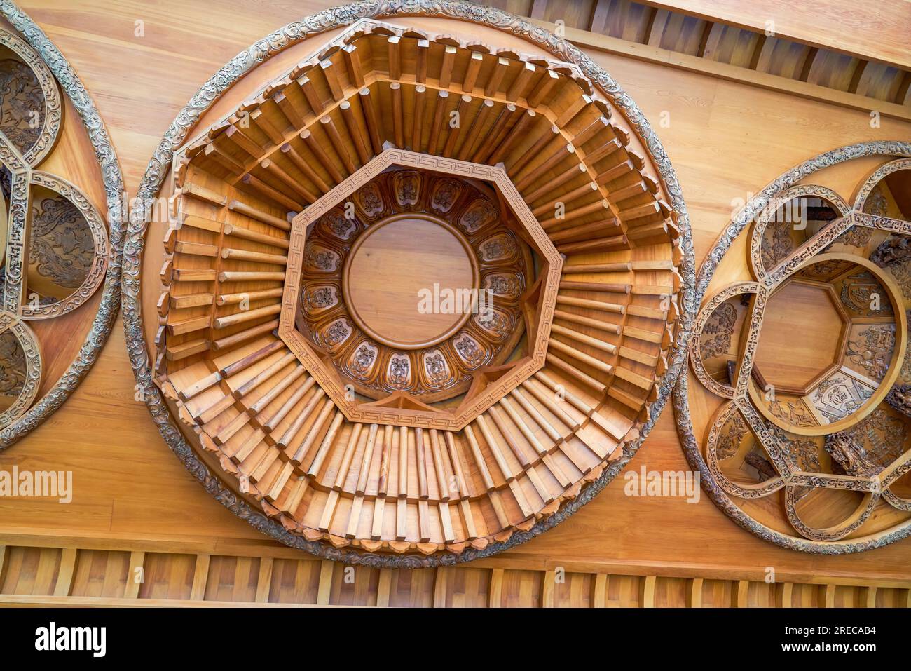 Wooden carved discs inside a luxurious Chinese style ancient building ...