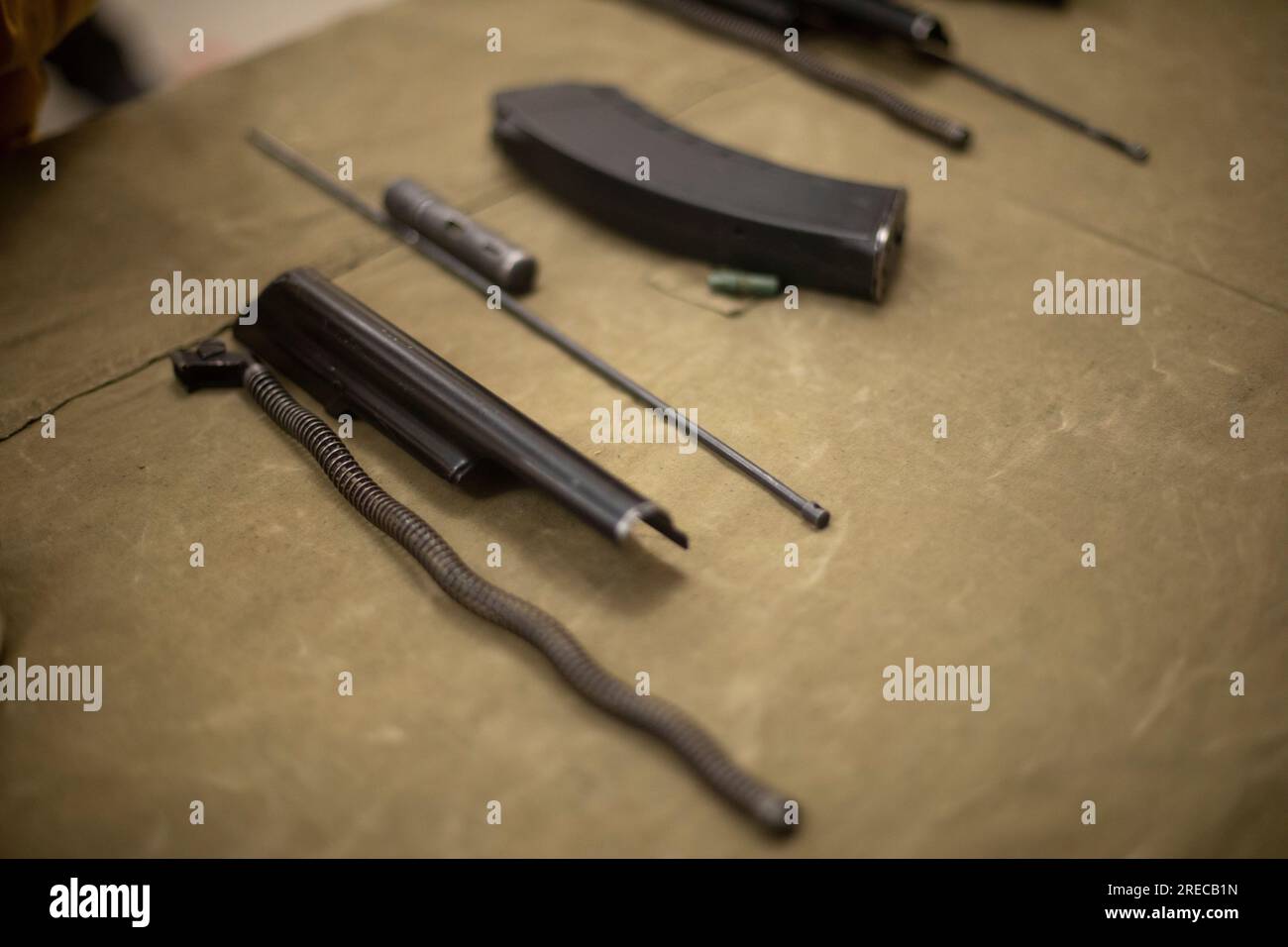 Disassembled machine. Military training. Weapon parts. Firearm. Machine ...
