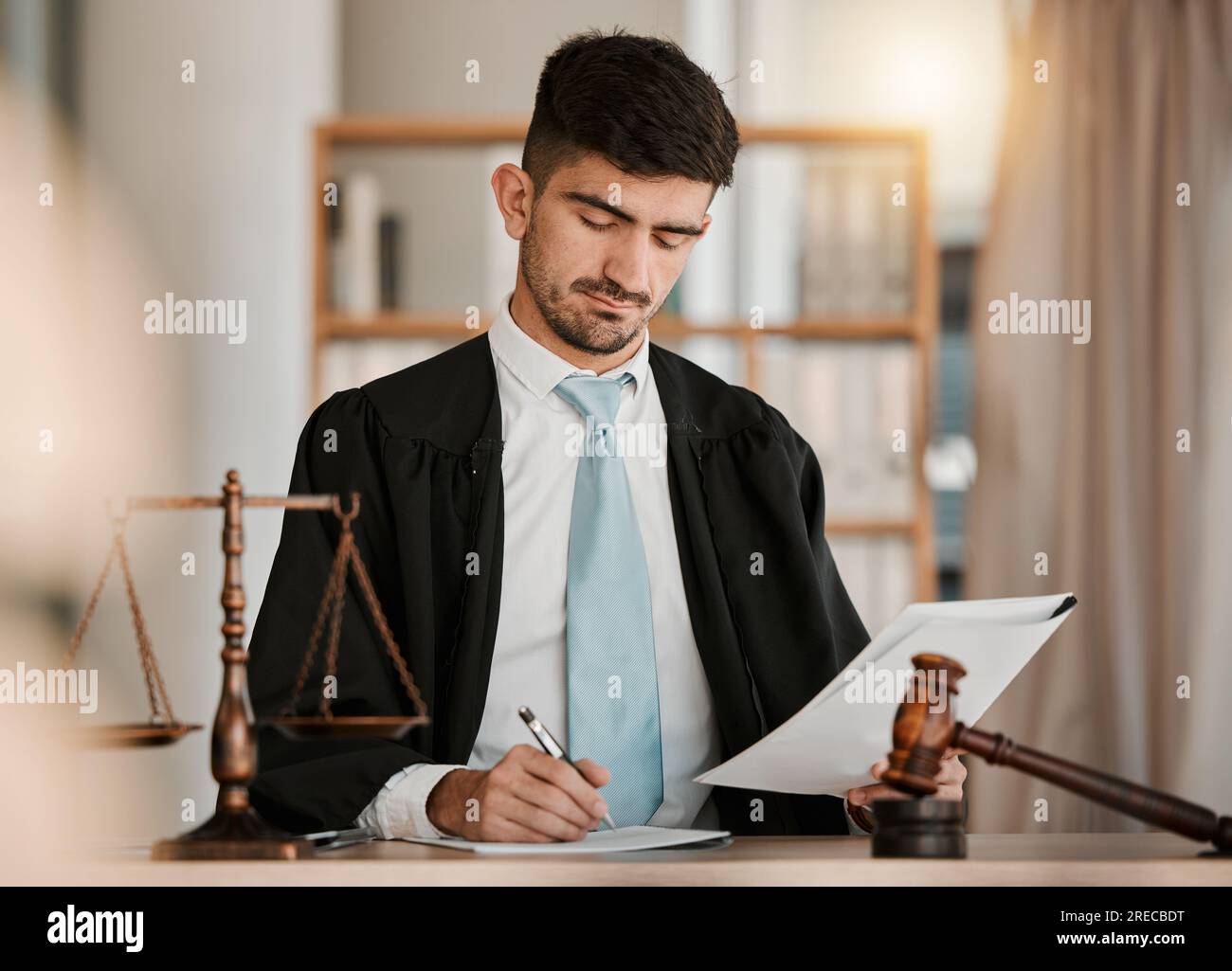 Attorney man, scales and hammer with writing, documents and notes for ...