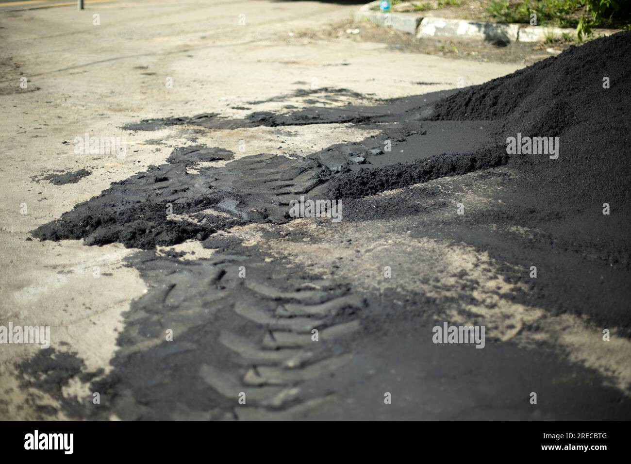 Hot asphalt. Laying road. Details of construction of road. Slide of ...