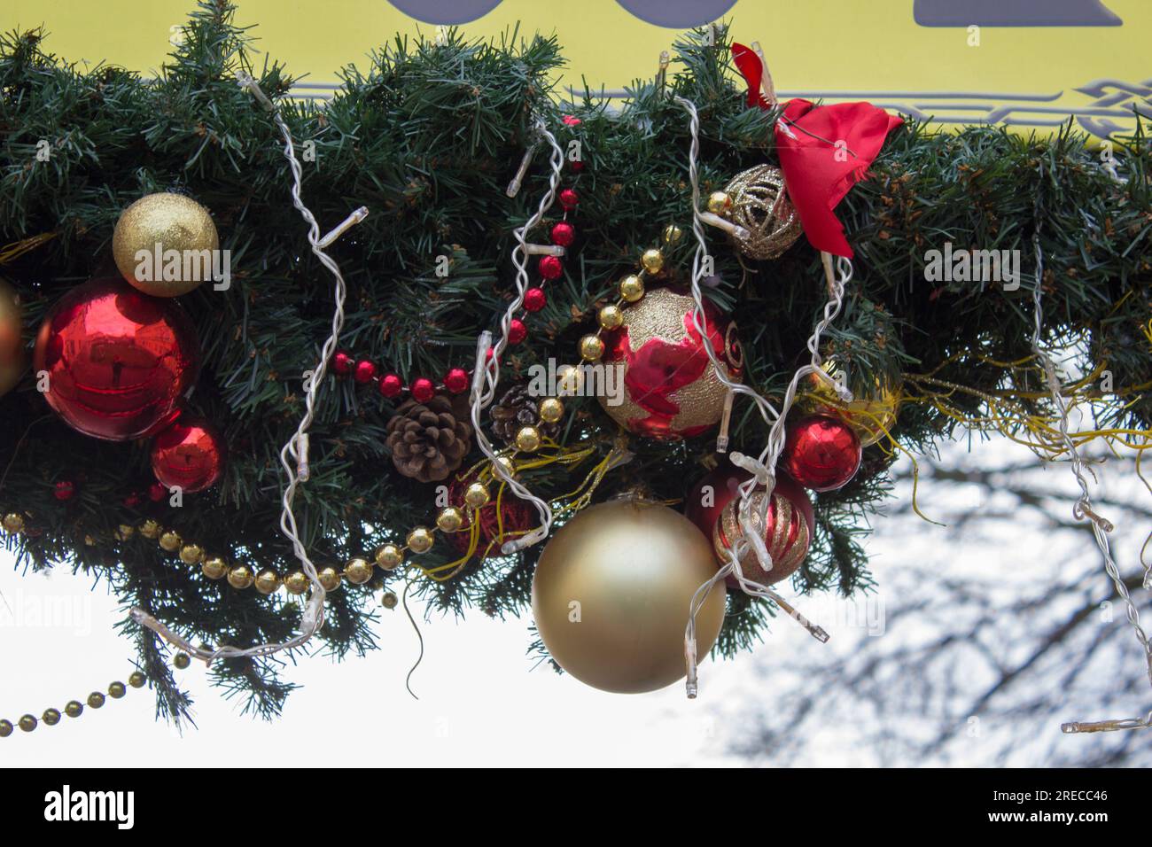 on the street is decorated with an arc of Christmas with garlands and ...