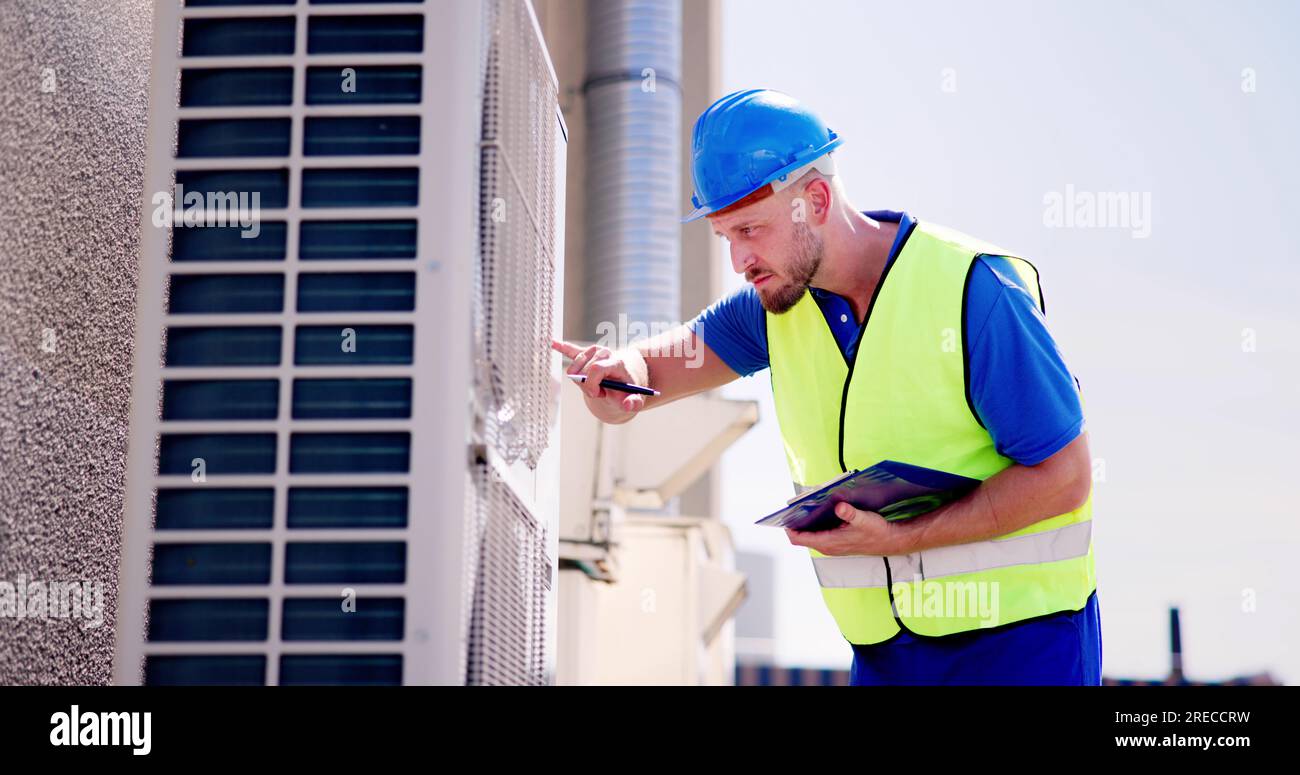 HVAC Air Conditioning Maintenance. AC Service Worker Stock Photo - Alamy