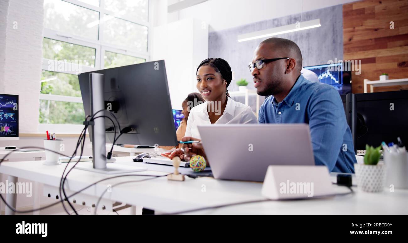 African Financial Data Analysts Using Performance Dashboard On Screens ...
