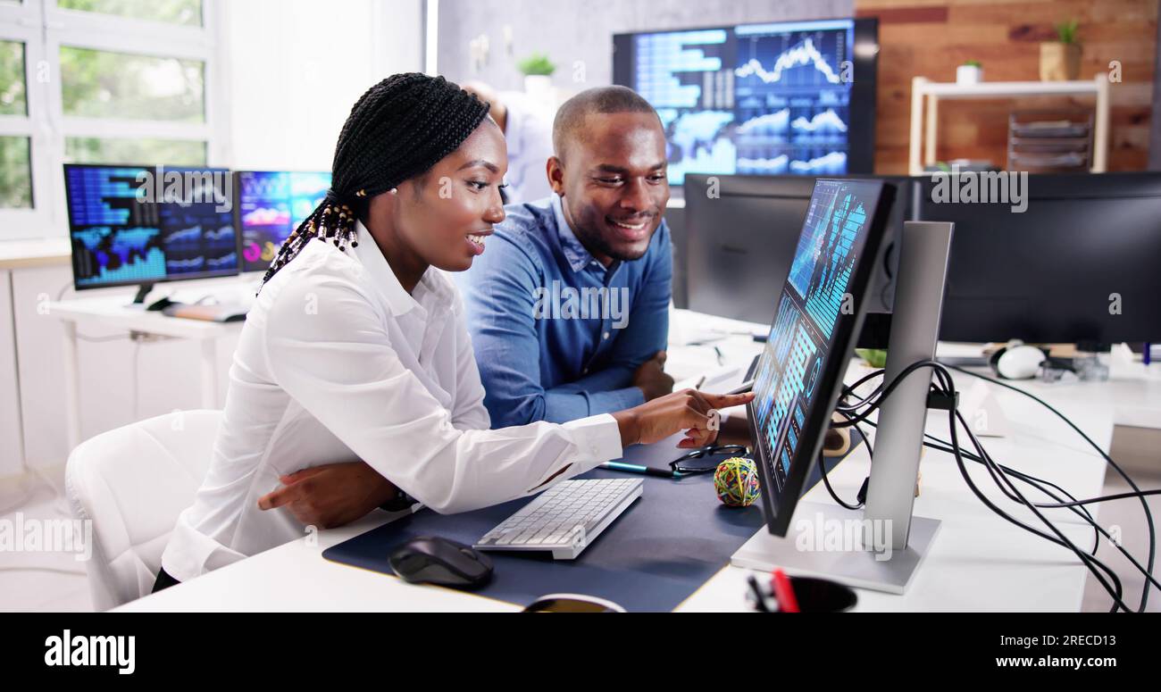 African Financial Data Analysts Using Performance Dashboard On Screens ...