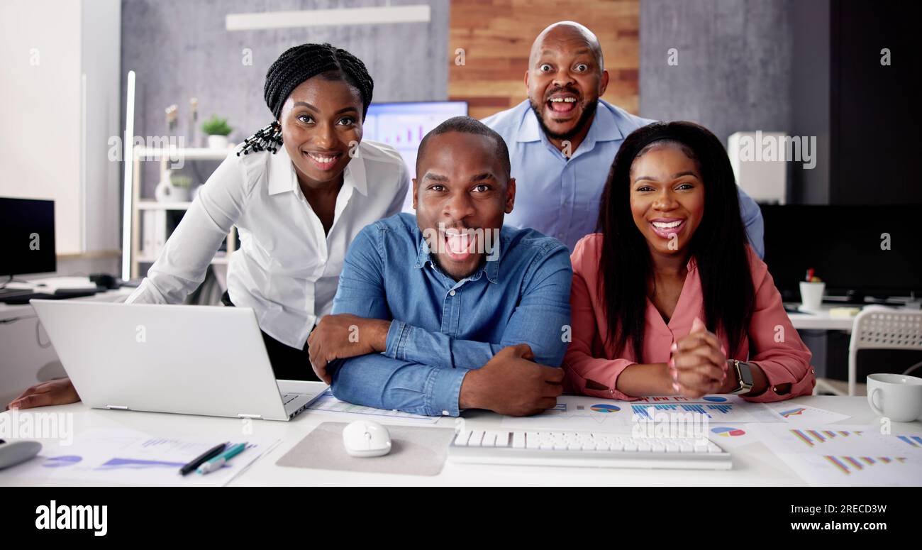 Corporate Success Celebration At Work. African Group Using Computer ...