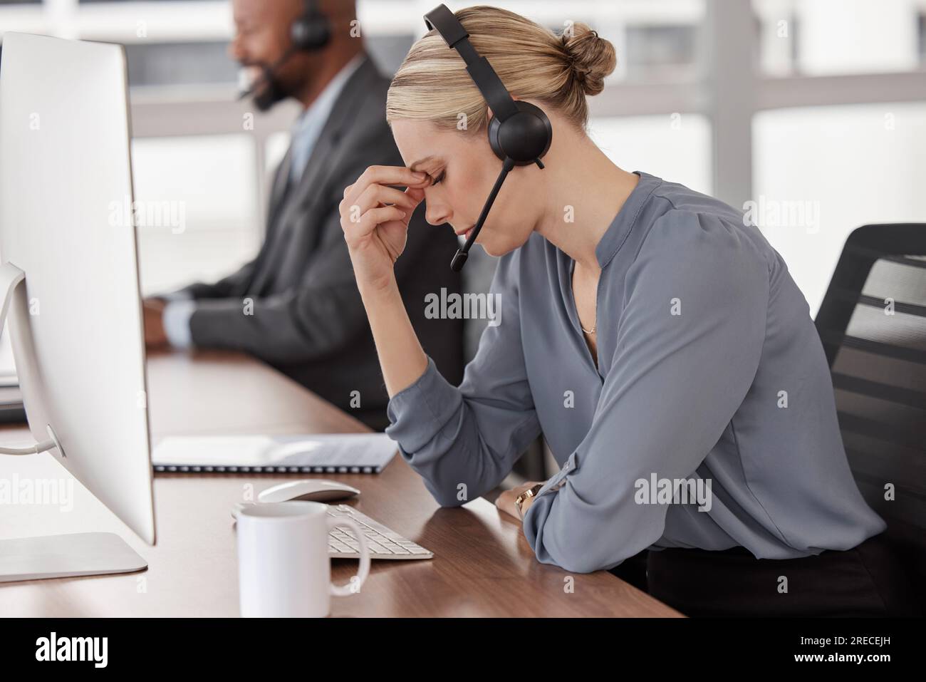 Tired receptionist hi-res stock photography and images - Alamy
