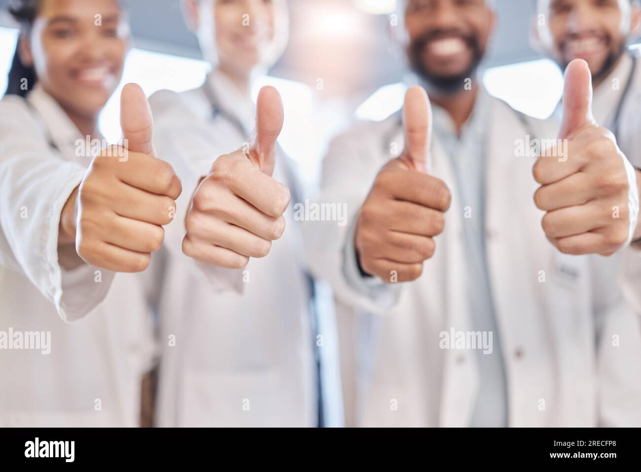 Thumbs up, hands and hospital doctors, happy people or surgeon team ...
