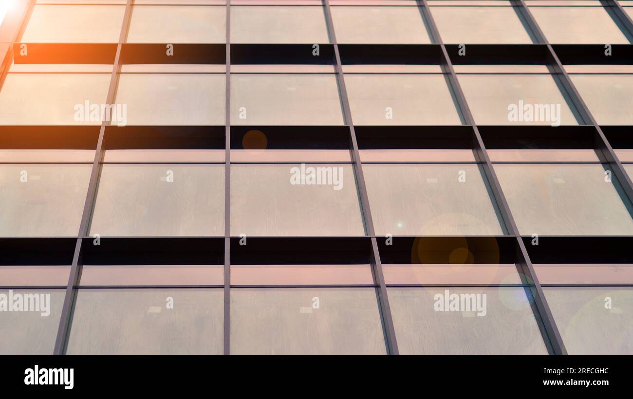 Structural glass wall reflecting blue sky. Abstract modern architecture fragment Stock Photo - Alamy