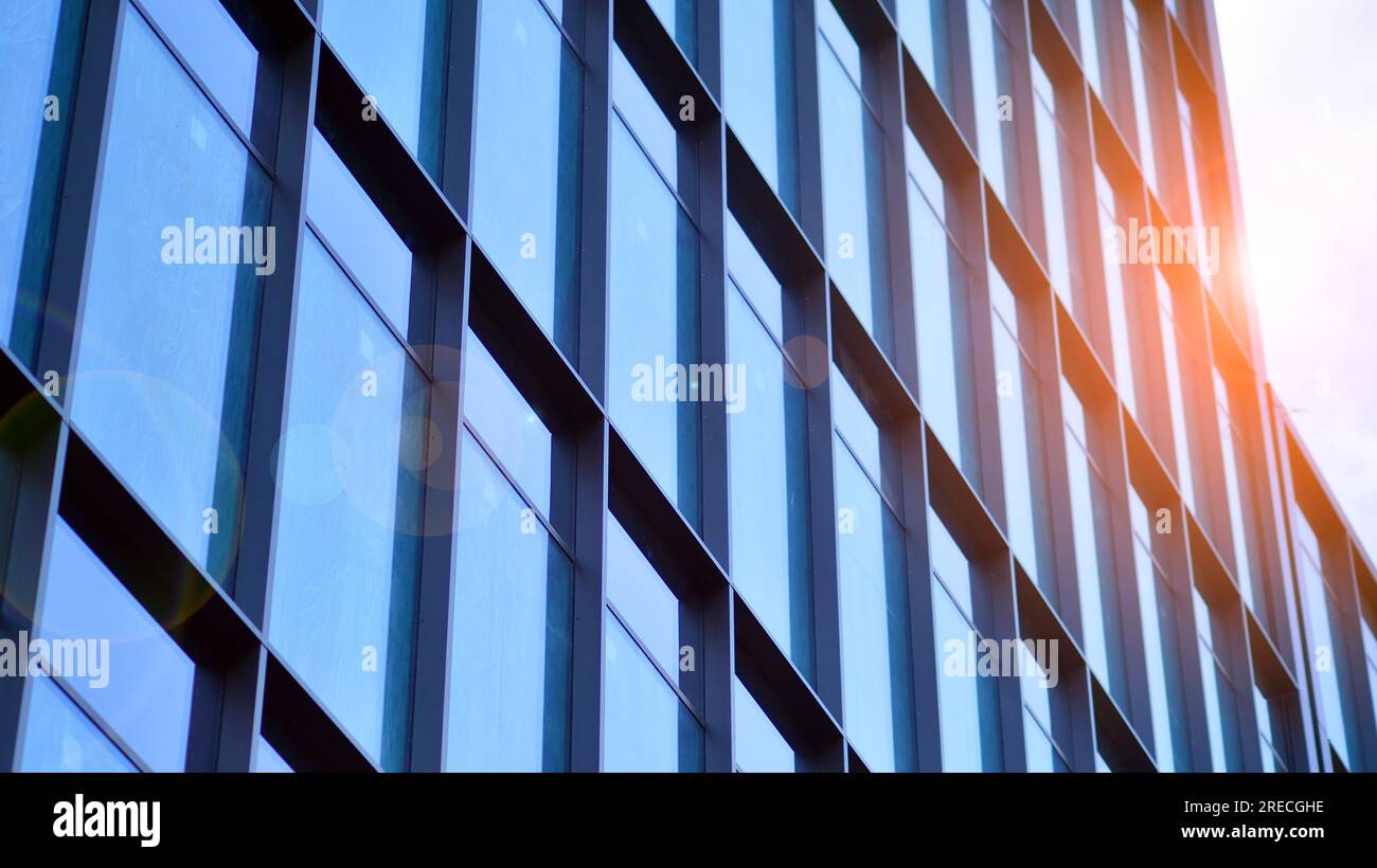 Structural glass wall reflecting blue sky. Abstract modern architecture fragment Stock Photo - Alamy