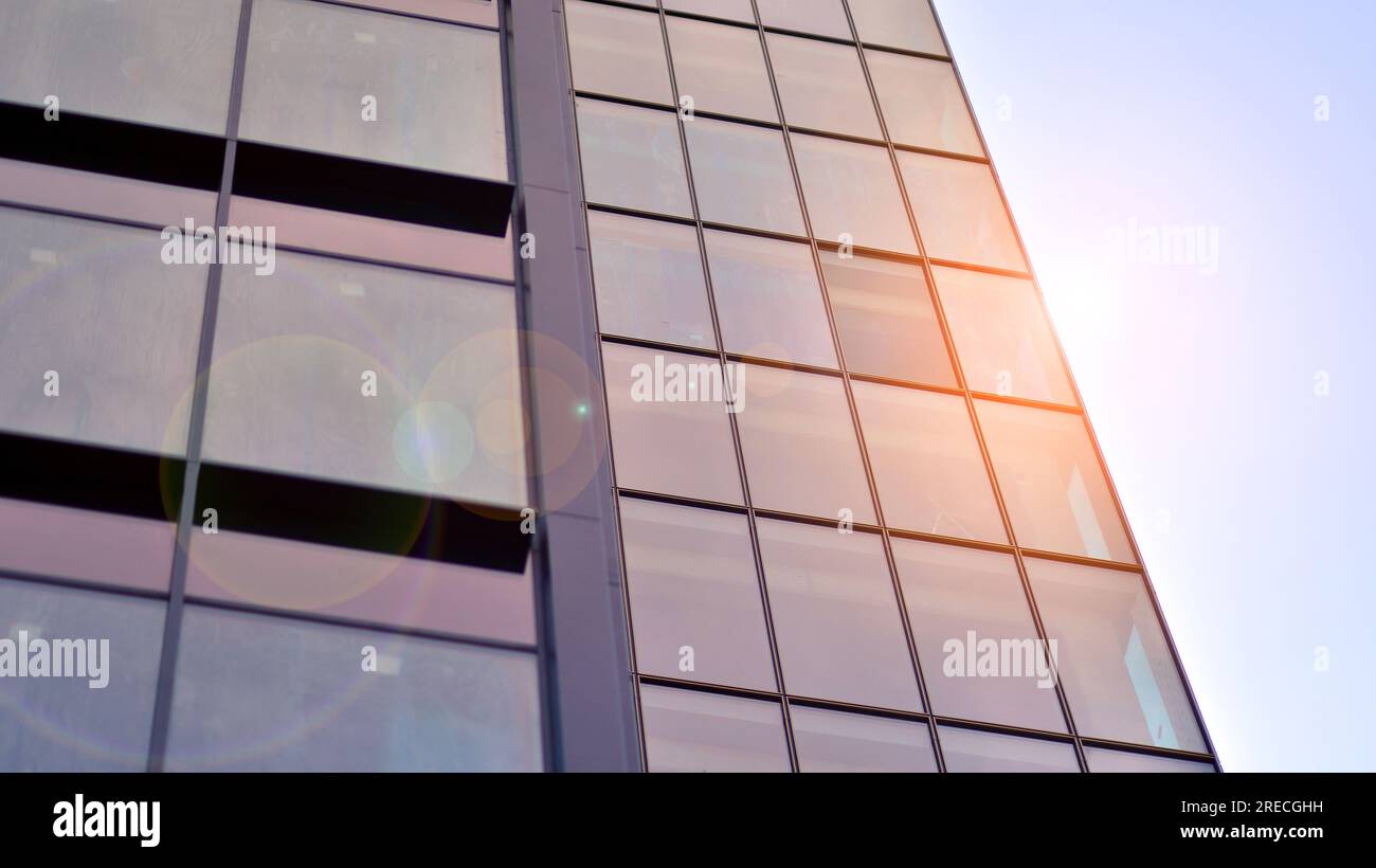 Structural glass wall reflecting blue sky. Abstract modern architecture fragment Stock Photo - Alamy