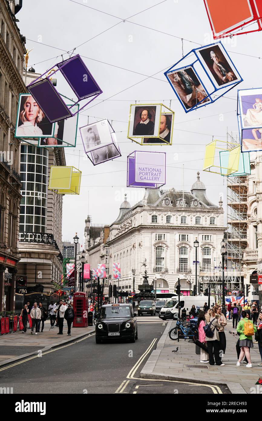 Over 50 giant cubes featuring portraits of UK entertainers above the ...