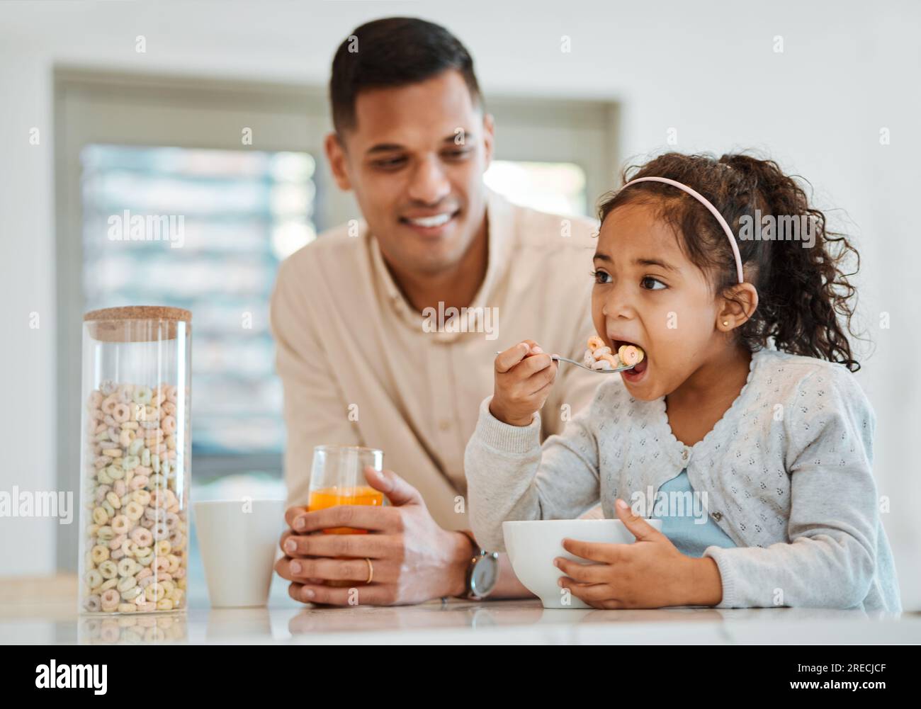Eating, morning and a child with father for breakfast, food in the ...